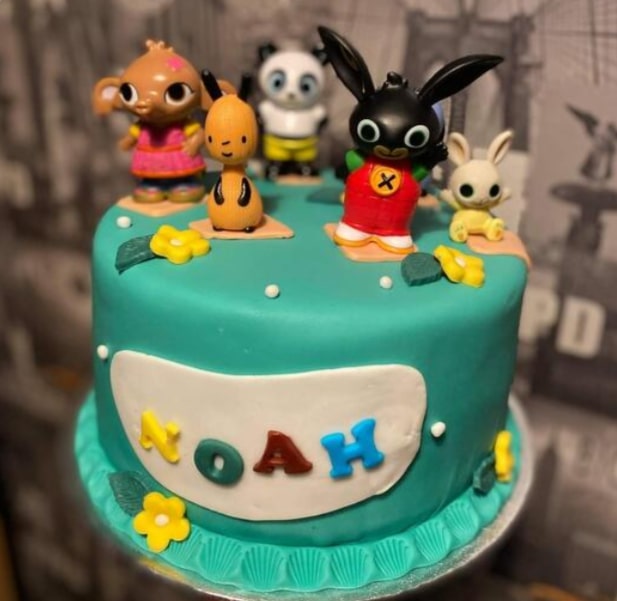 Birthday cake with plastic toys - Cakes Sydney